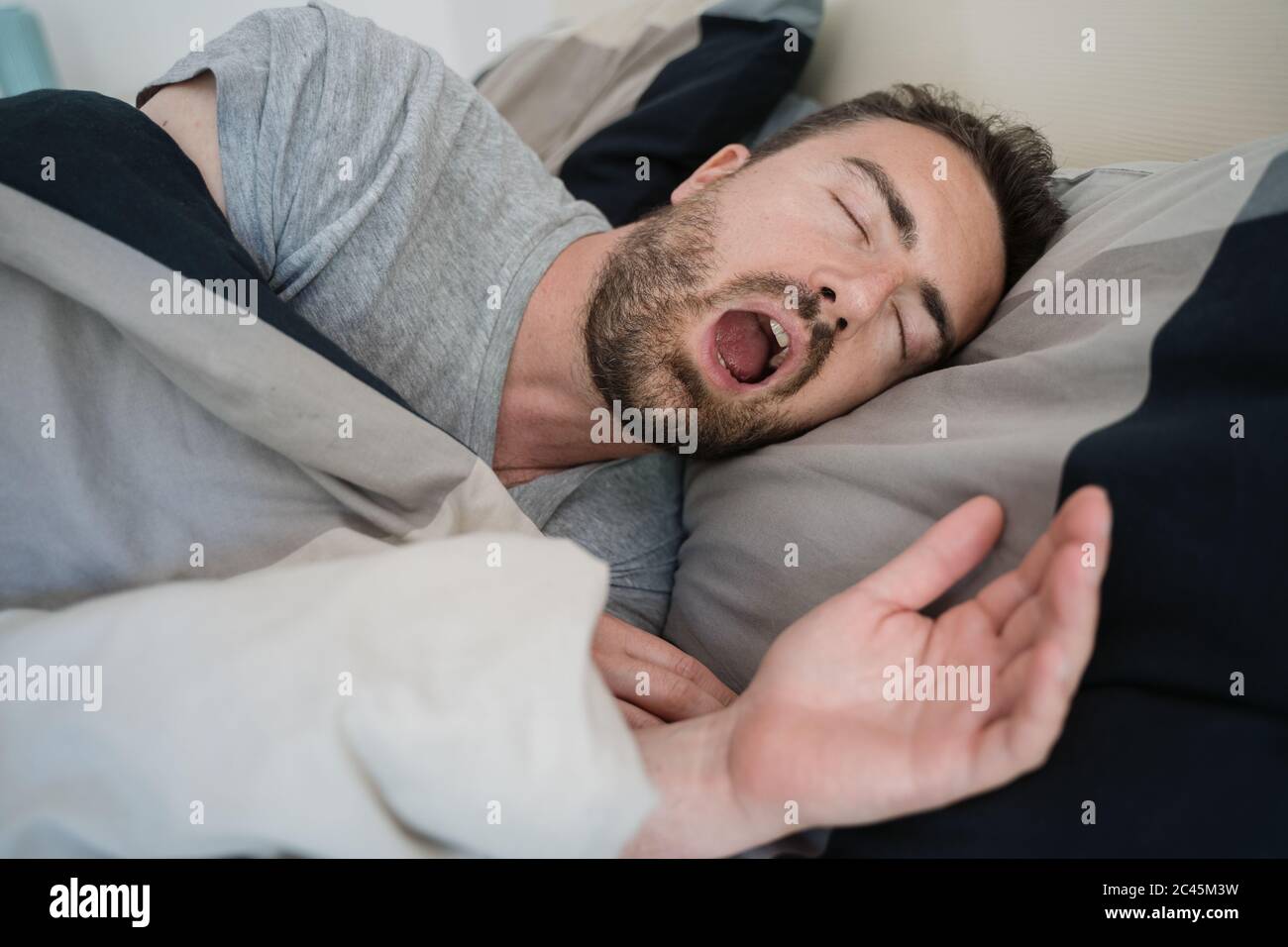 Mouth open asleep hi-res stock photography and images - Alamy