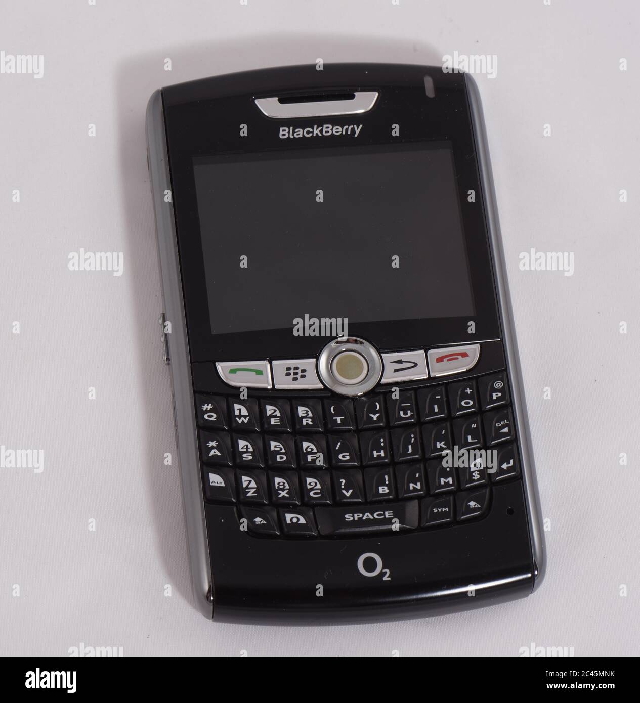 Old personal communication device and telephone, a Blackberry on UK ...