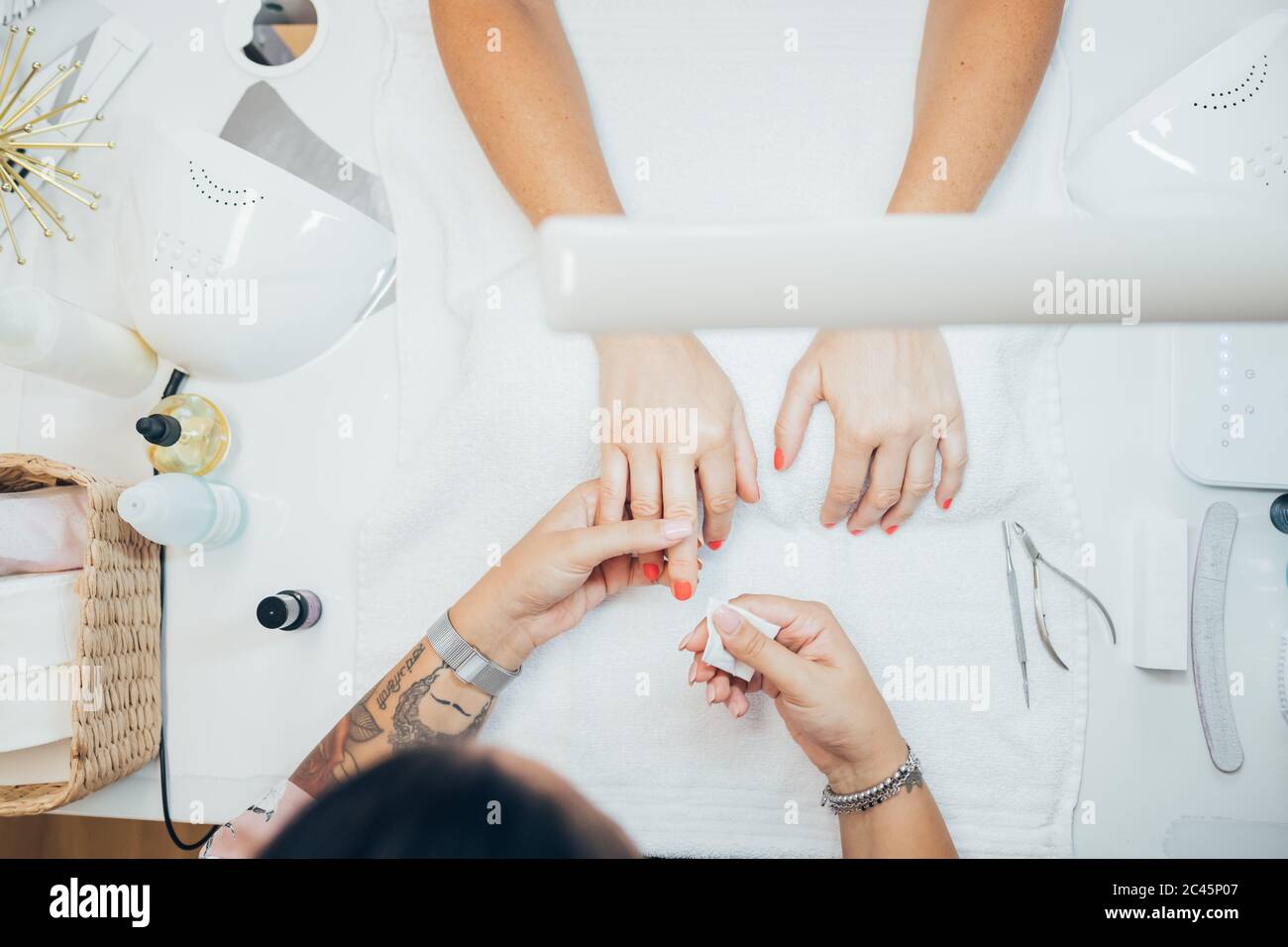 Woman getting a manicure in a beauty salon Stock Photo - Alamy