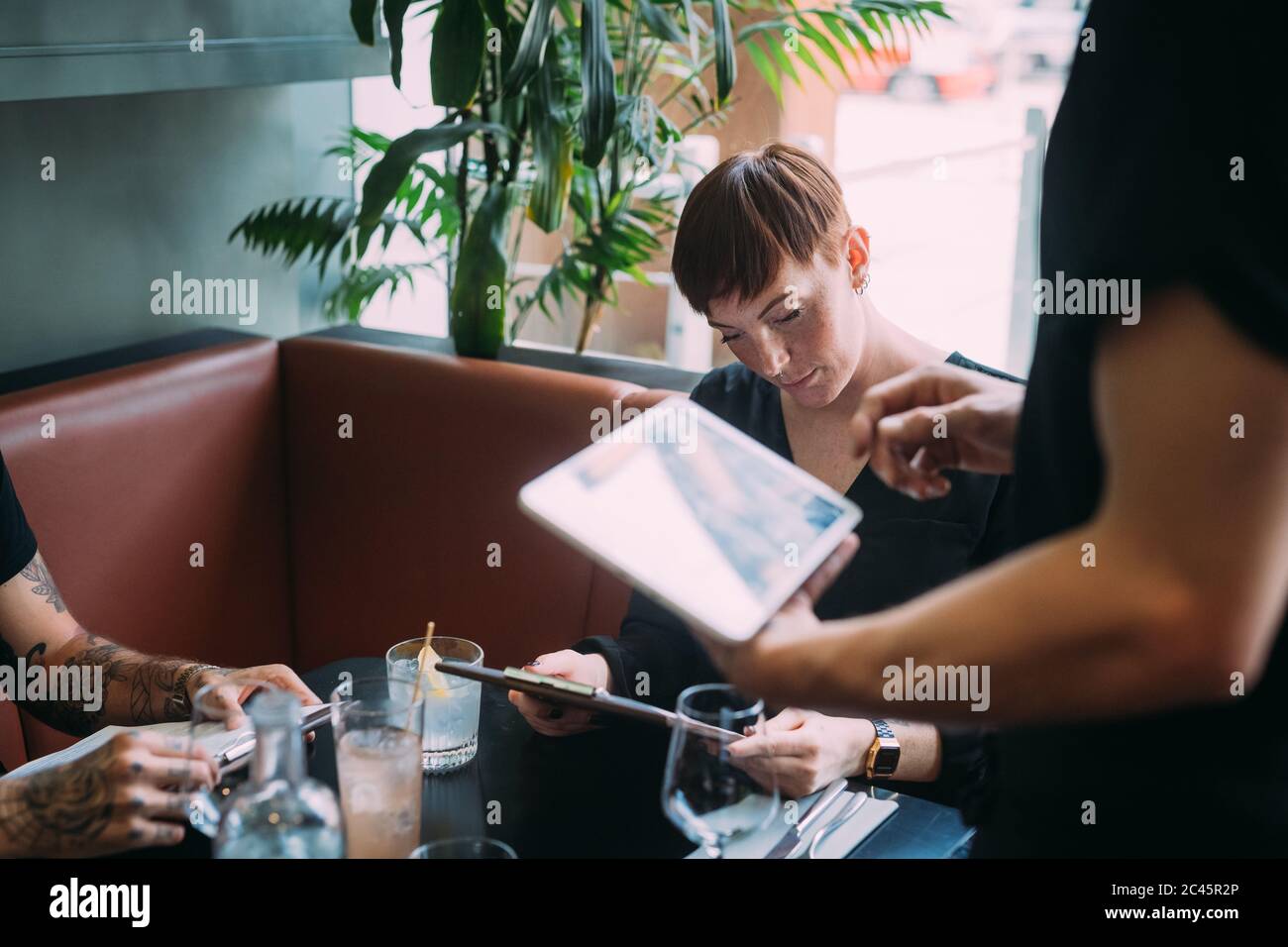 Smart waiter taking order hi-res stock photography and images - Alamy