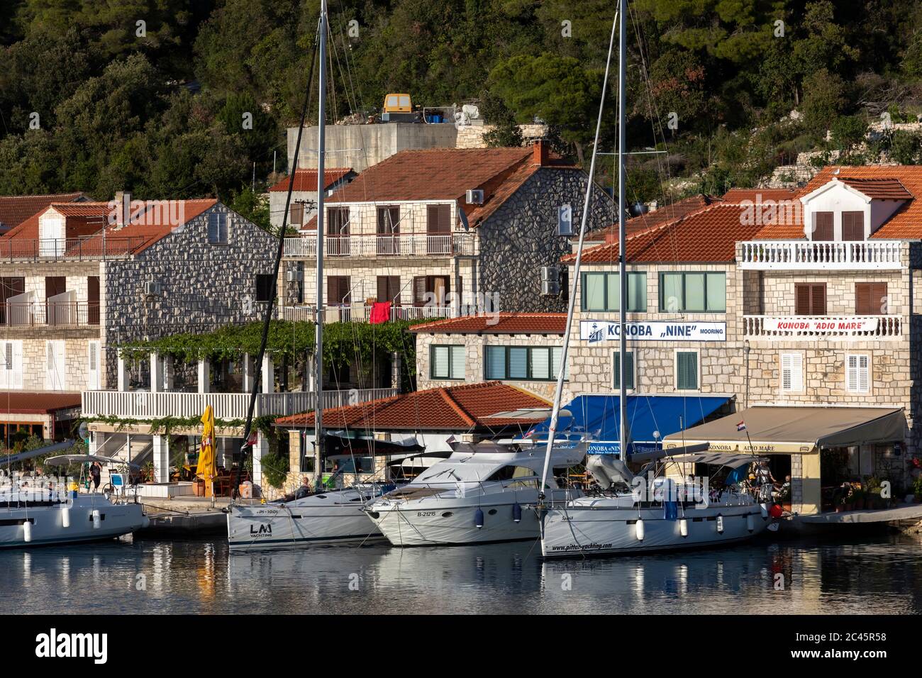 Pomena,Mljet island,Croatia -June 14, 2020 : sailboats mooring in front ...