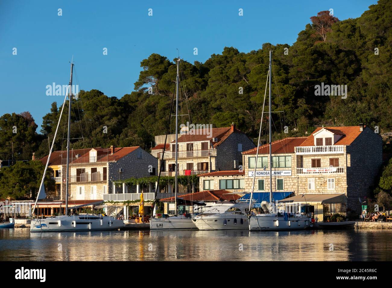 Pomena,Mljet island,Croatia -June 14, 2020 : sailboats mooring in front ...