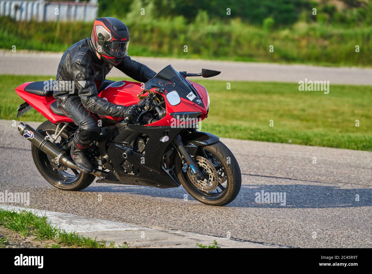 Speeding round a race circuit hi-res stock photography and images - Alamy