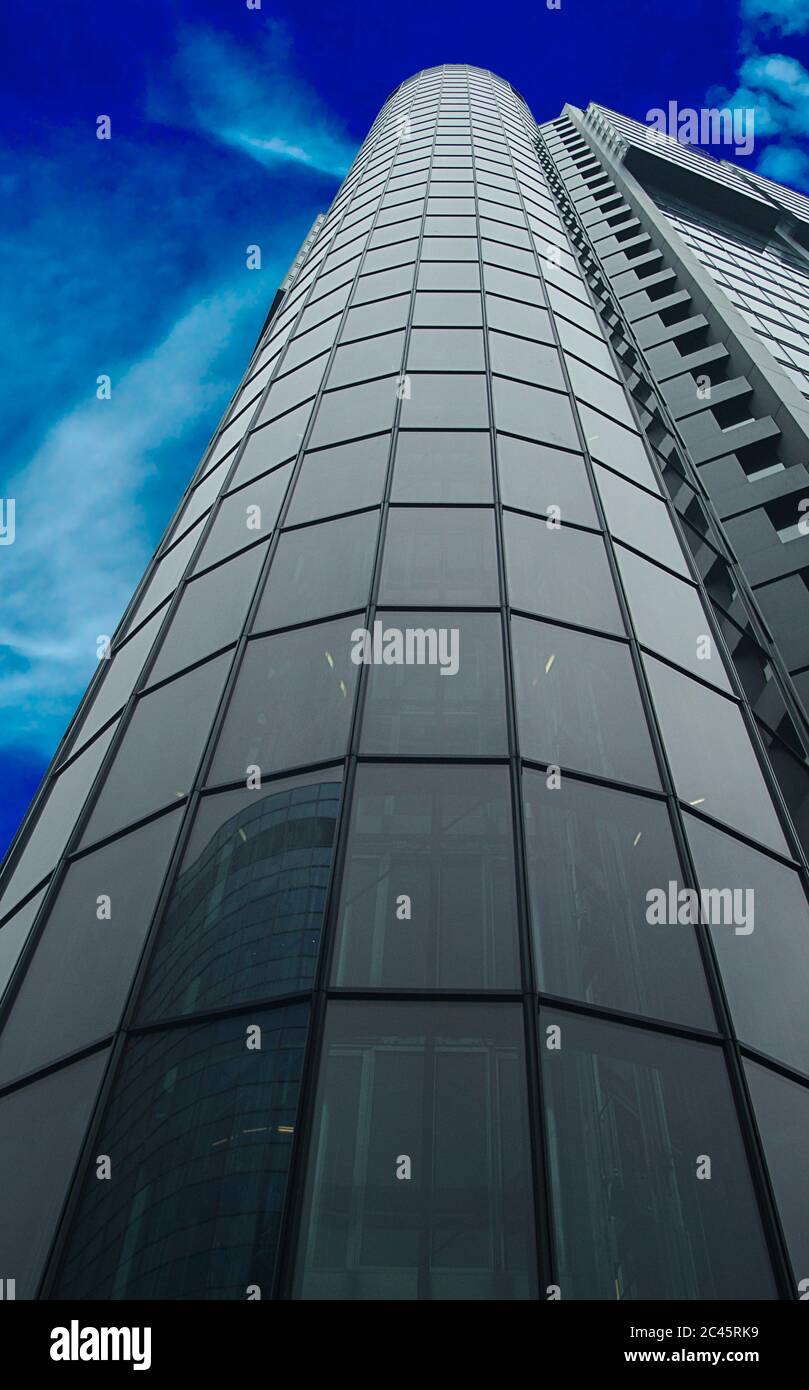 Office building in front of a blue sky Stock Photo - Alamy