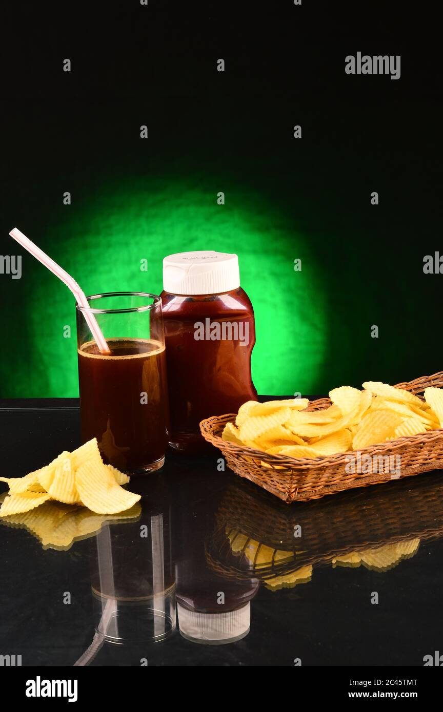 Drink with potato chips Stock Photo - Alamy