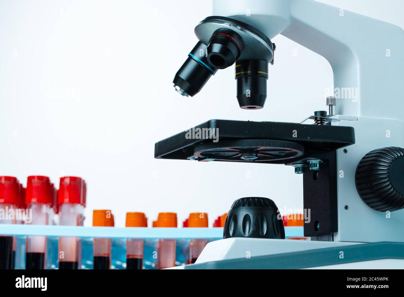 Microscope with blood samples test tubes close up Stock Photo - Alamy