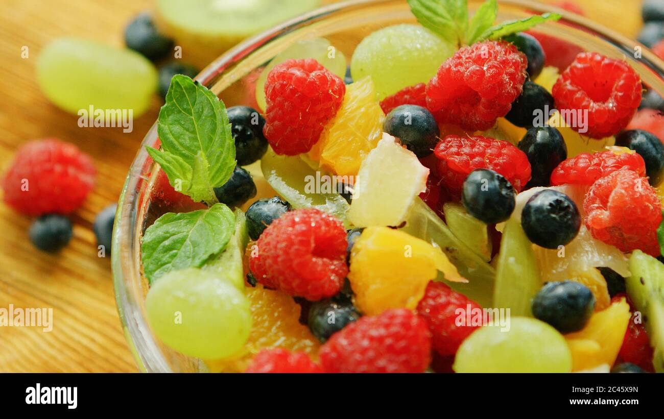 Fresh mix of fruit and berry Stock Photo - Alamy