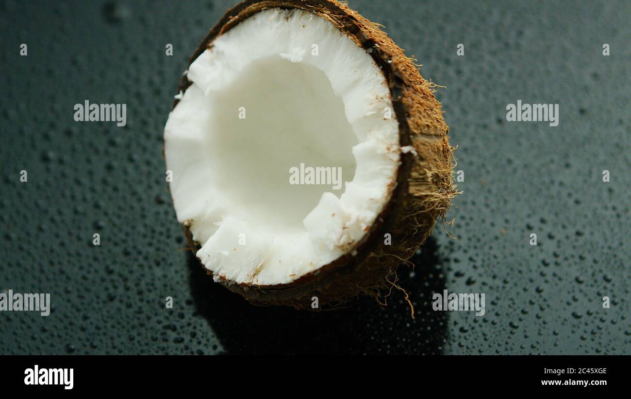 Half of white fresh coconut Stock Photo - Alamy
