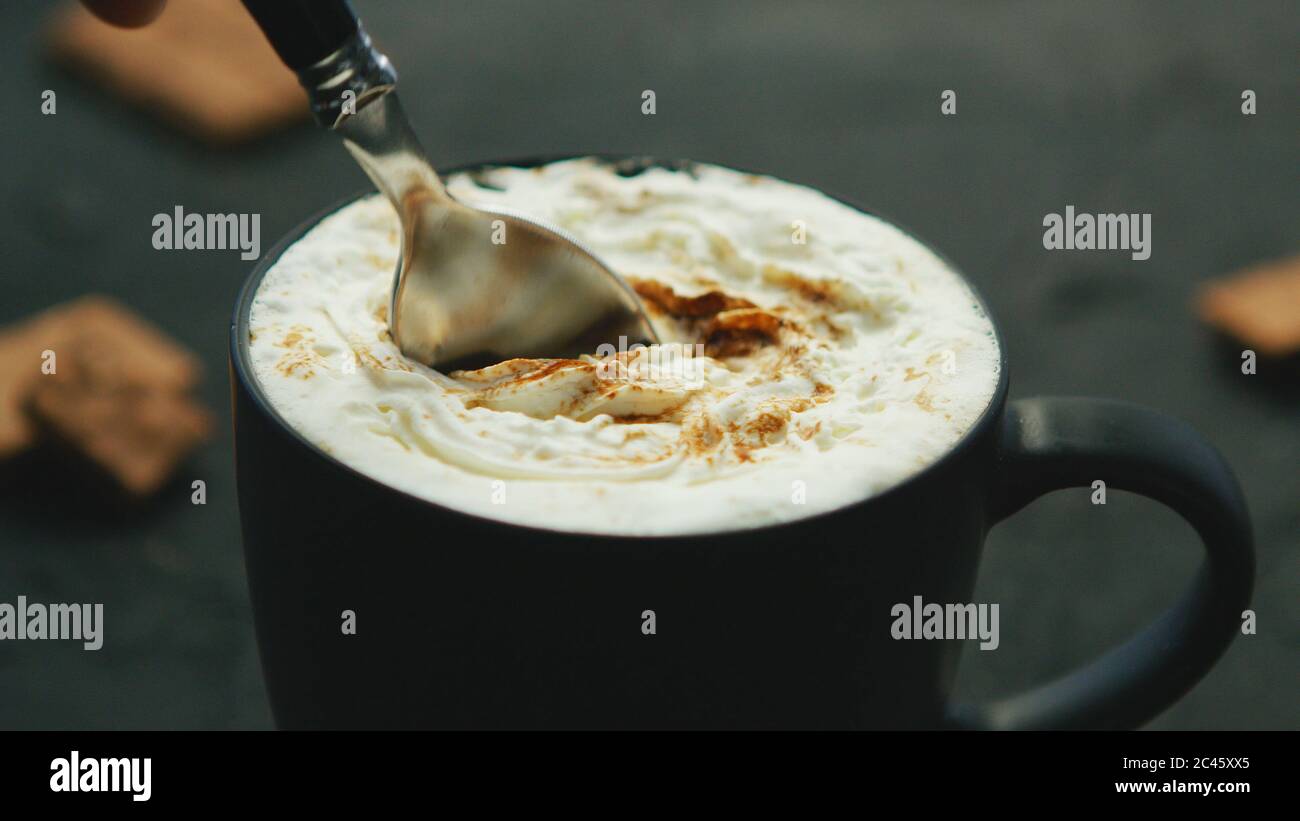 Cup of coffee with cream Stock Photo - Alamy