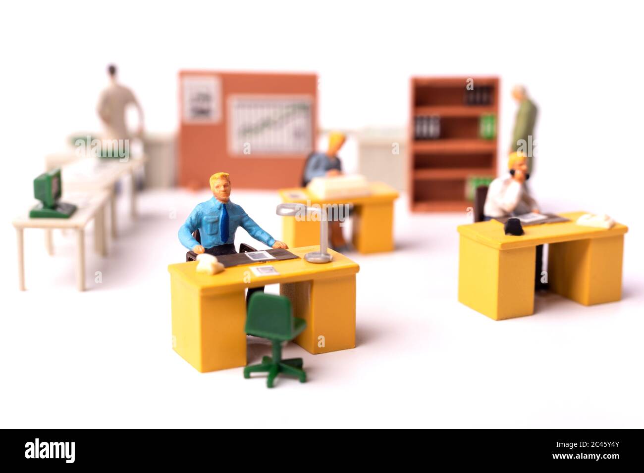 Miniature business people team at the office. Macro shot of Tiny people ...