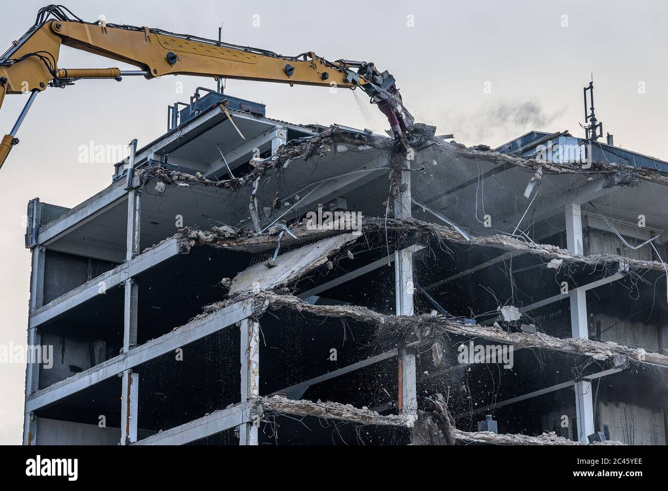 Building House Demolition site Excavator with hydraulic crasher machine ...