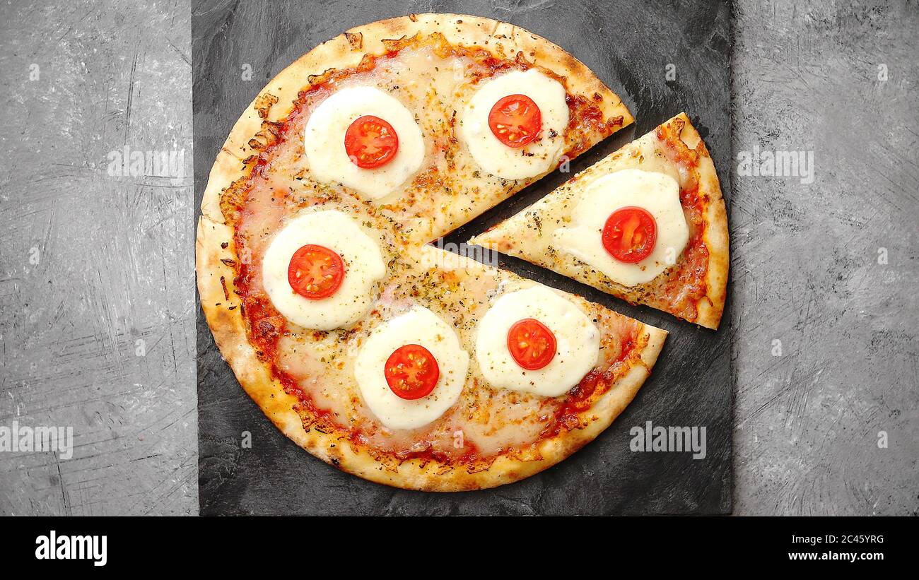 Homemade pizza with tomatoes, mozzarella Stock Photo - Alamy