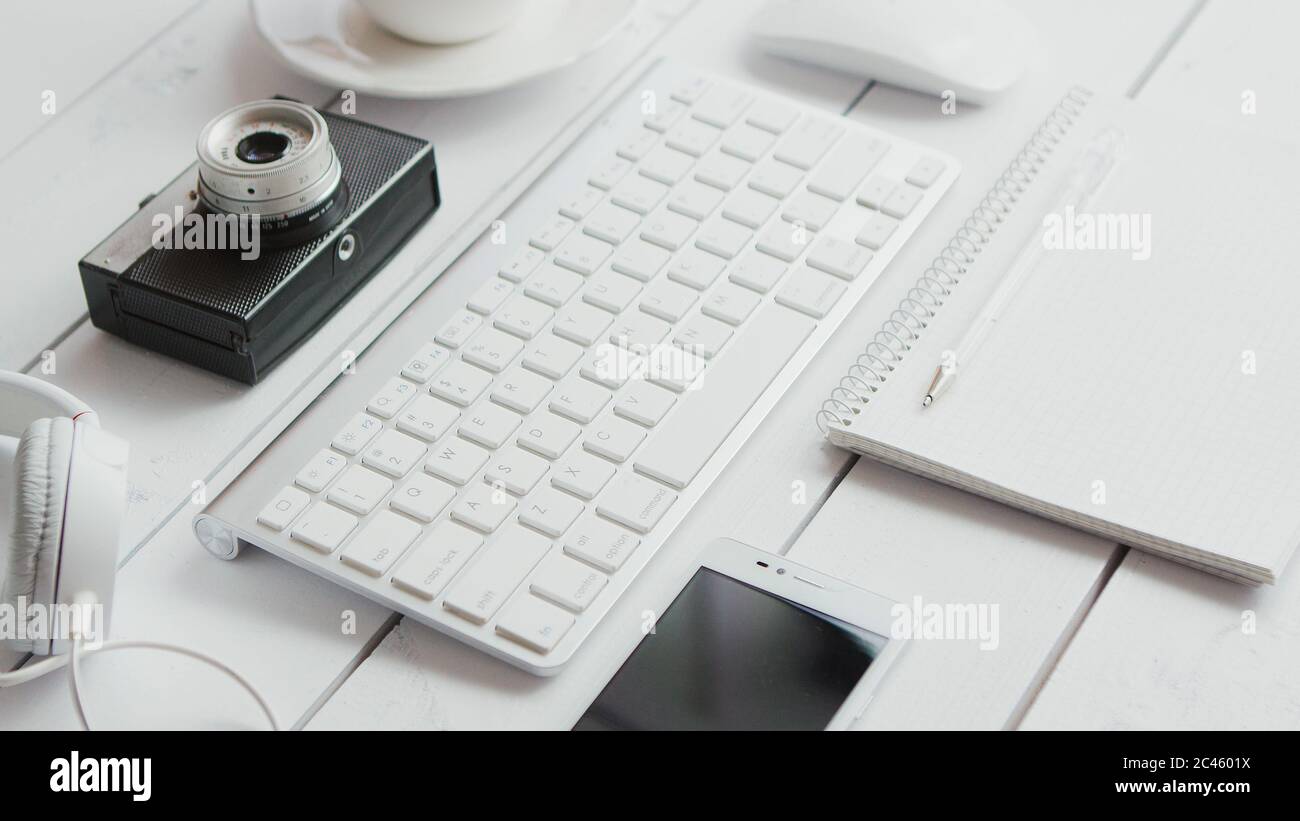 Office gadgets and photo camera Stock Photo - Alamy