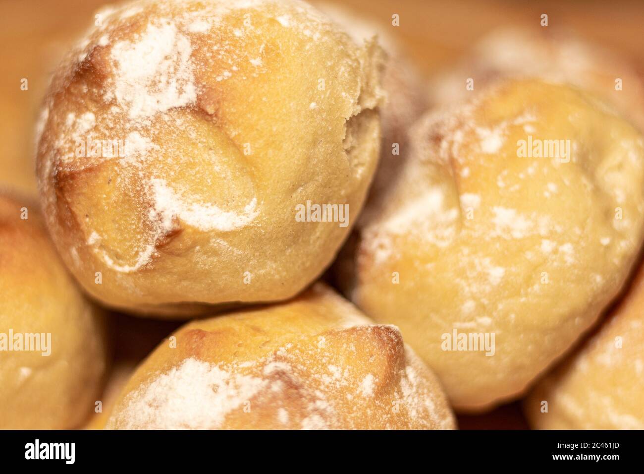 Closeup shot of sweet round biscuits tossed in sugar powder Stock Photo ...