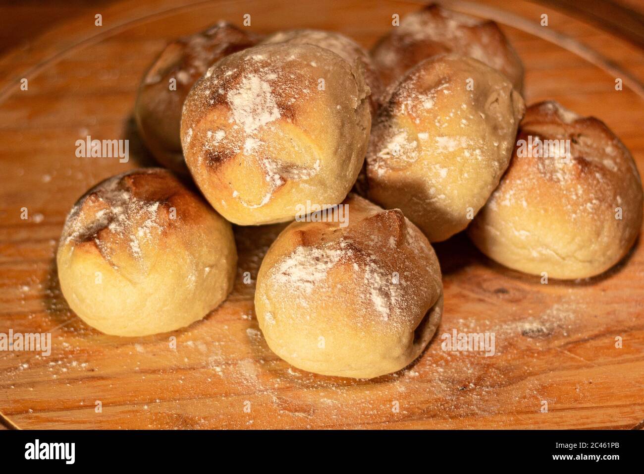 Closeup shot of sweet round biscuits tossed in sugar powder Stock Photo ...