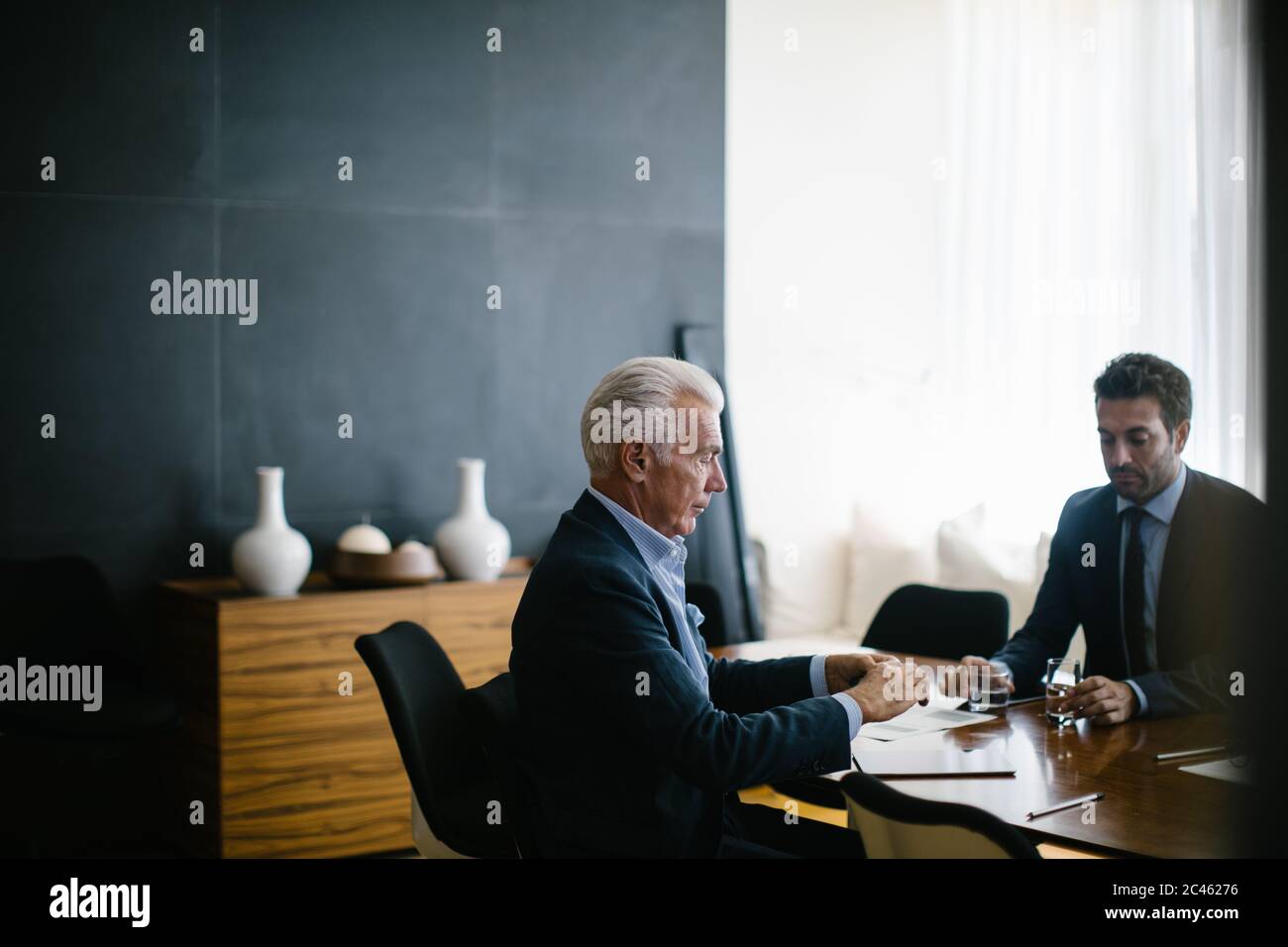 Business people meeting men only table hi-res stock photography and ...