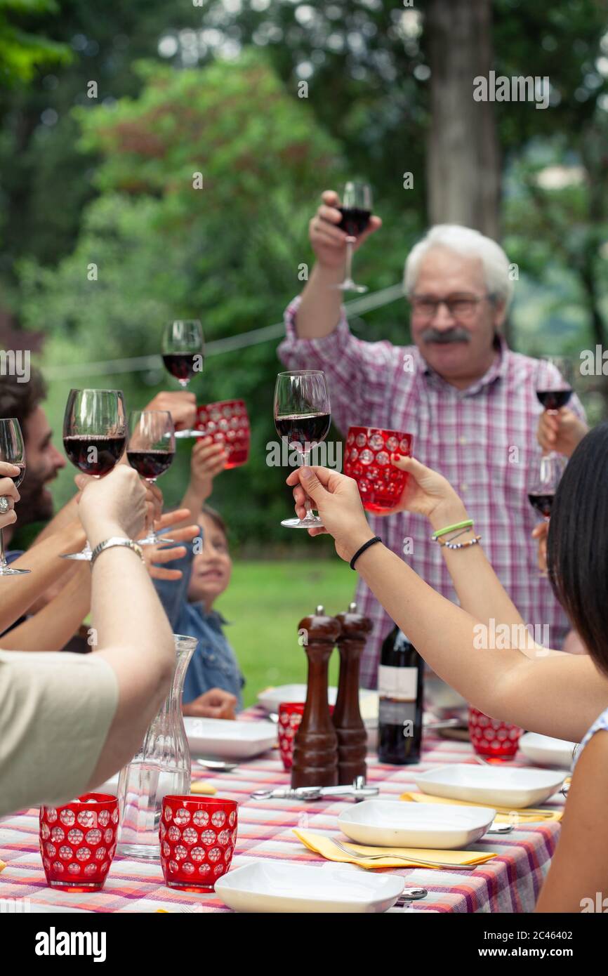 Three people making a toast hi-res stock photography and images - Alamy