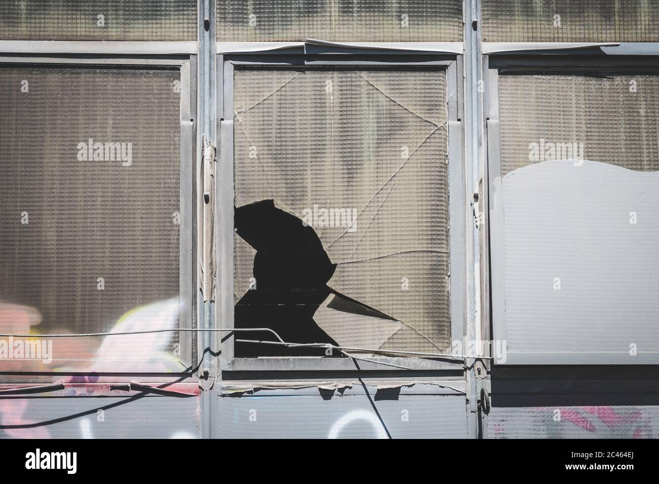 broken window, shattered glass on old factory window Stock Photo - Alamy