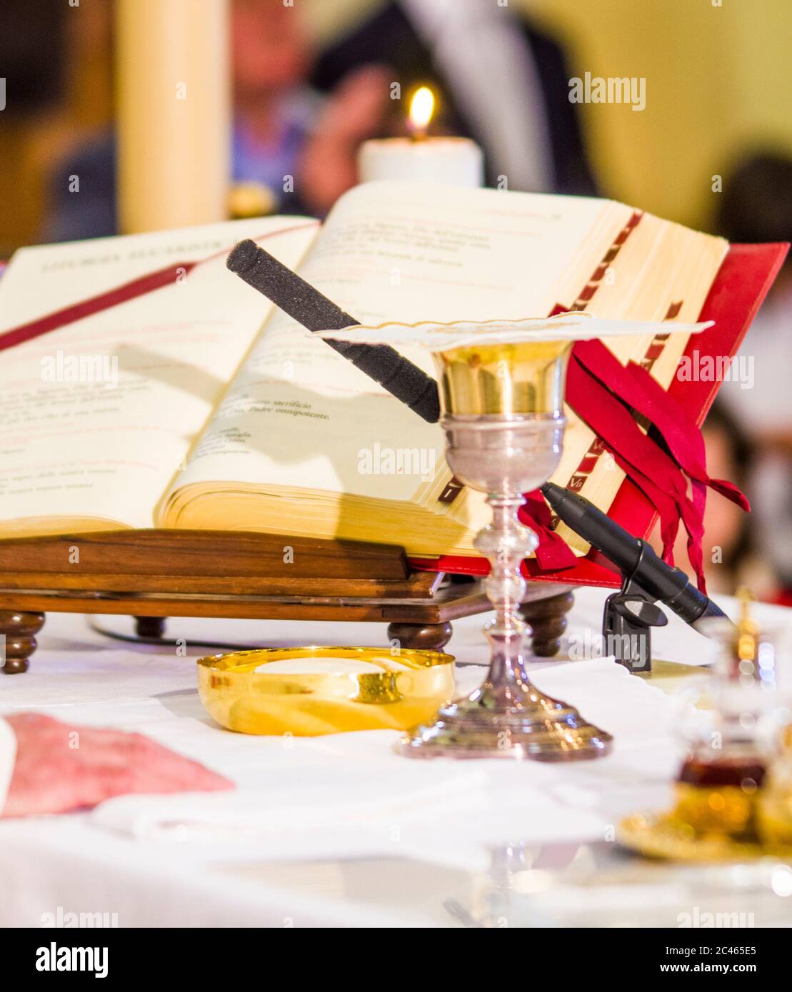 altar with host that becomes the body of jesus christ and chalice for ...
