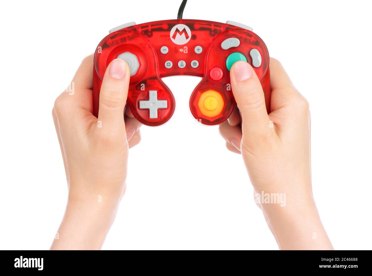 Kiev, Ukraine - May 15, 2019: Woman hands holding Mario GameCube ...
