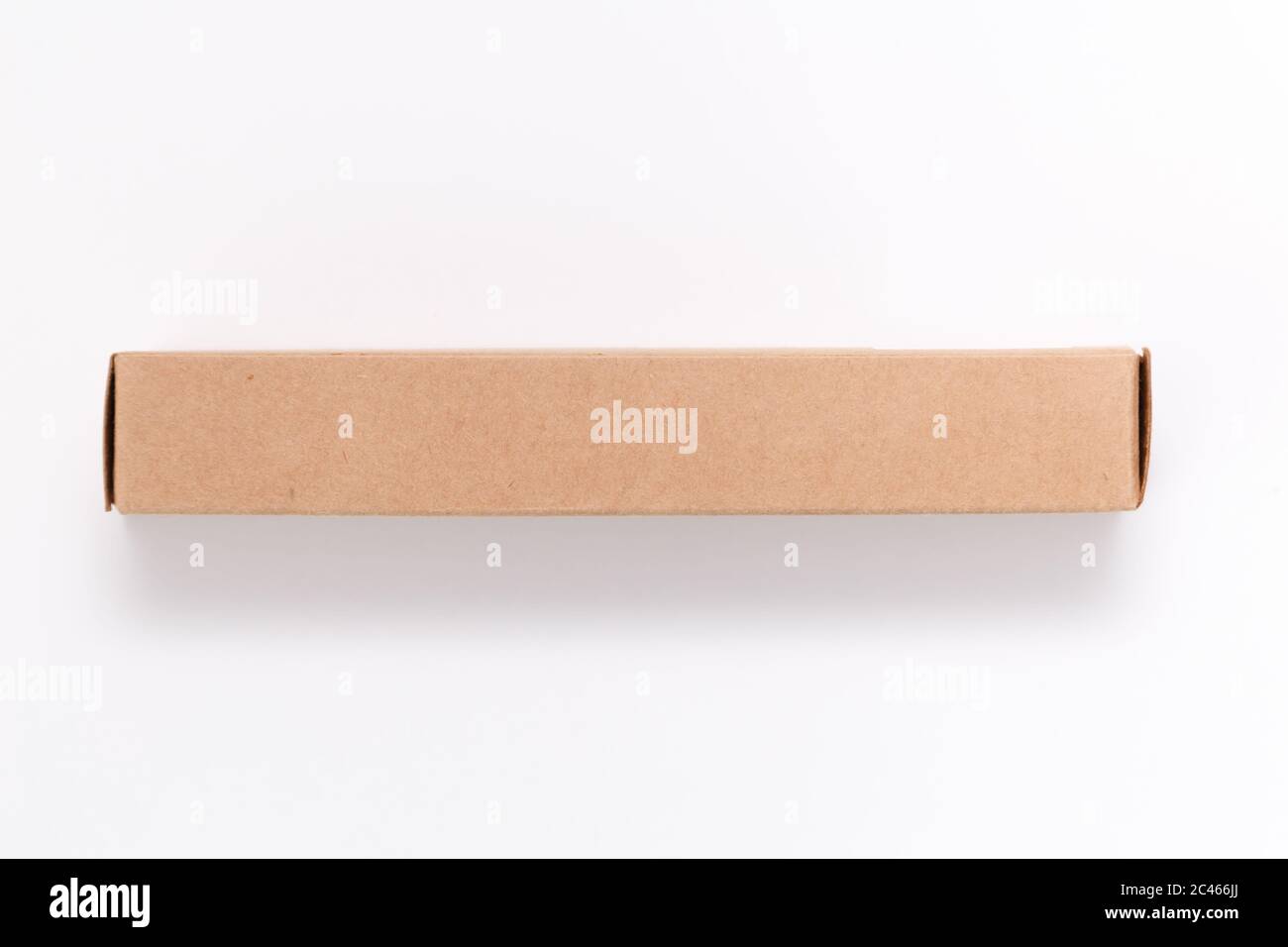 Oblong cardboard box on white background. Mock-up image. Flat lay, top ...