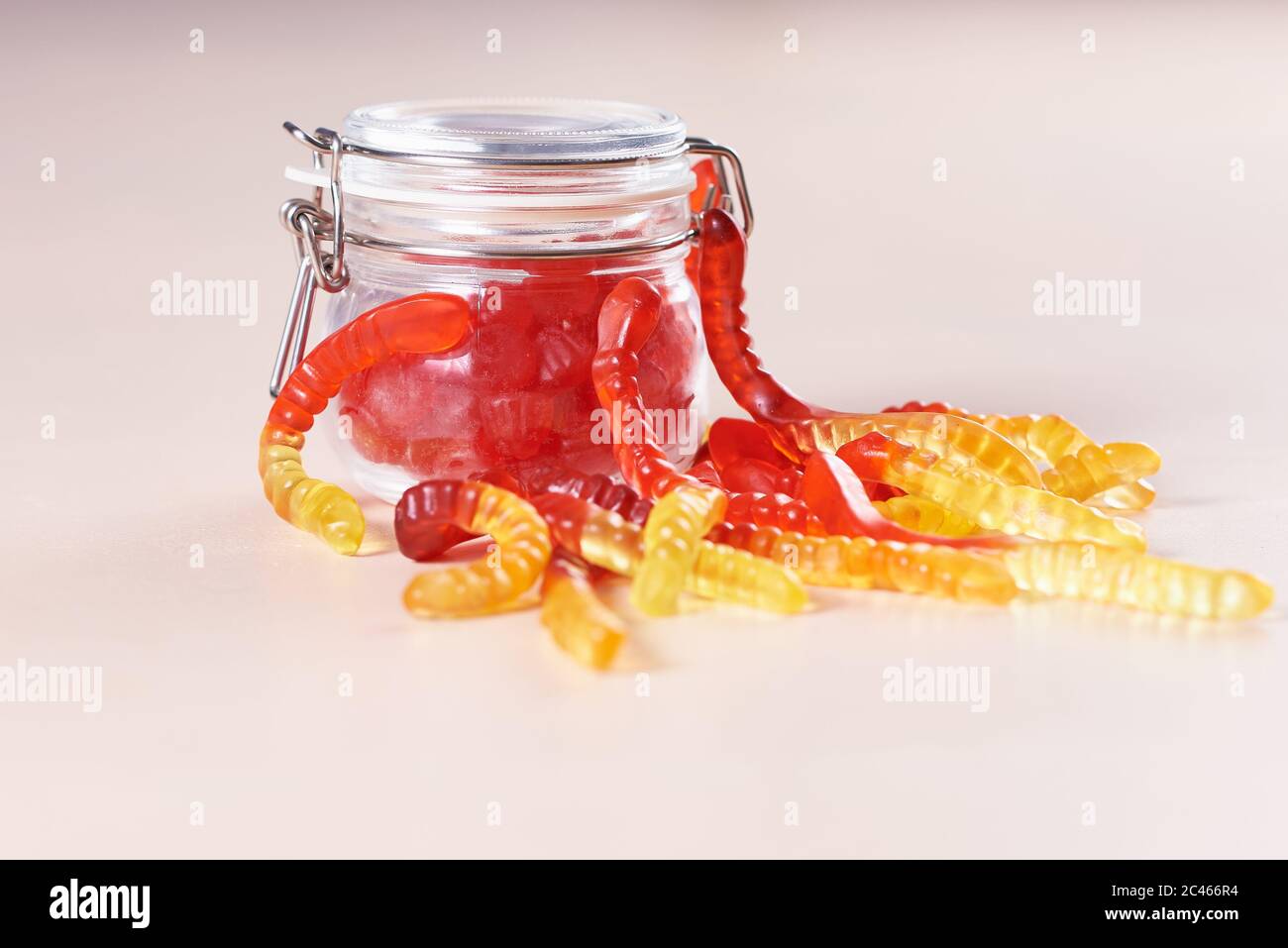 Colorful jelly worms snakes in a glass jar Stock Photo - Alamy