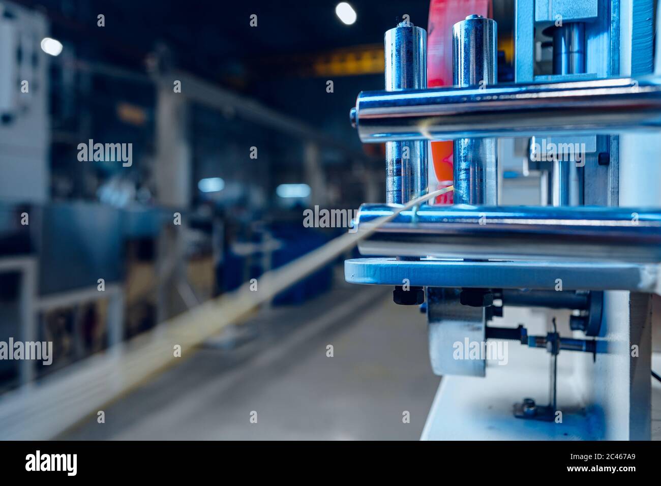 Inside a modern plant producing power electric cables and optical ...