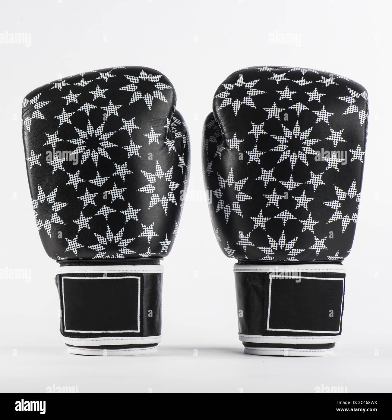 Black boxing gloves isolated on the white background Stock Photo - Alamy