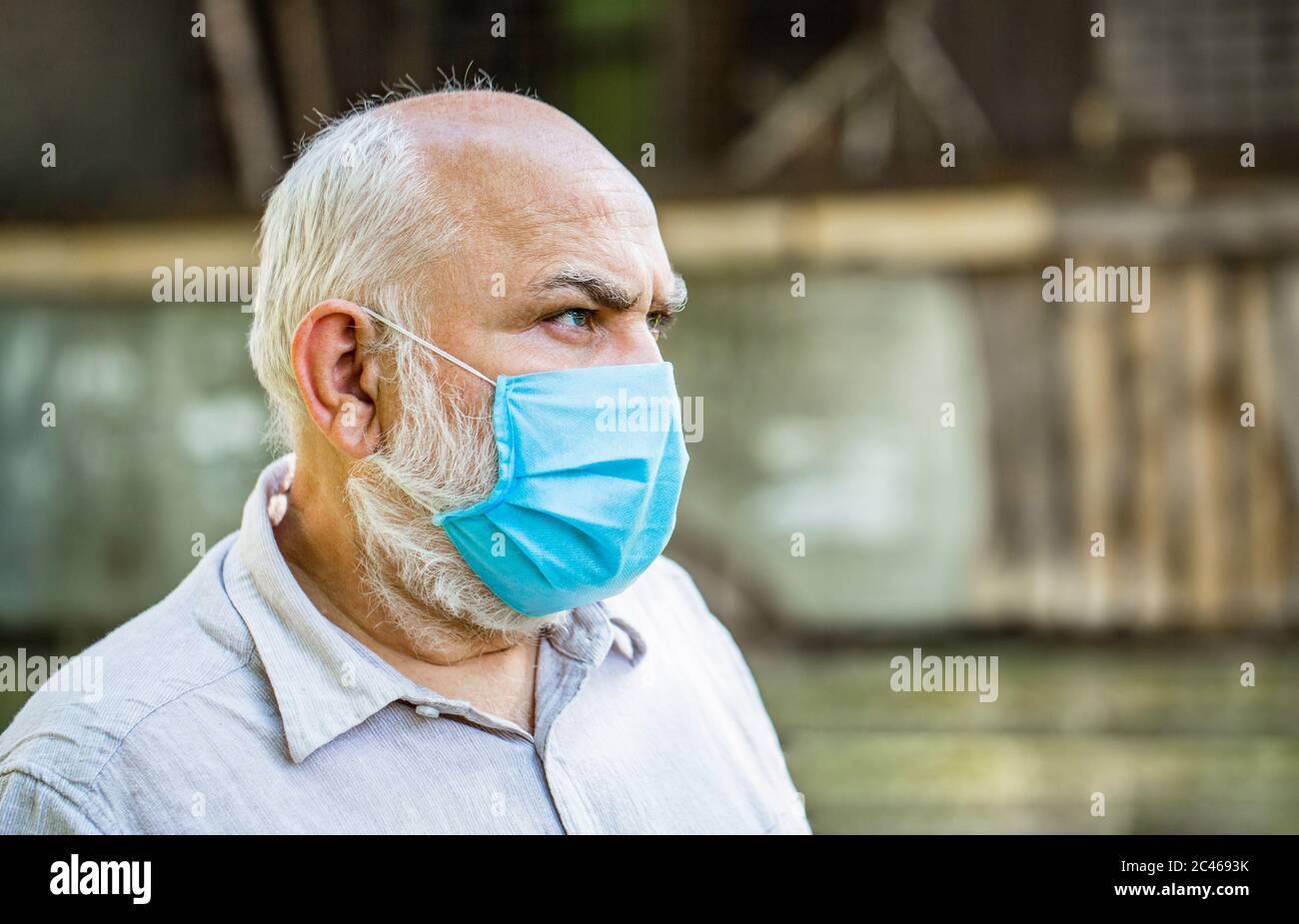 Coronavirus, illness, infection, quarantine, medical mask. Old man ...