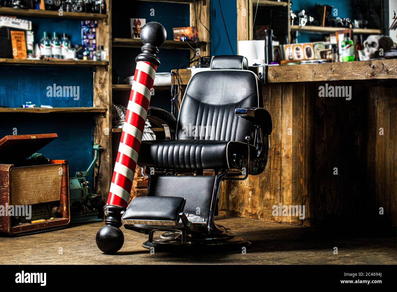 Hairstylist in barbershop interior. Barber shop chair. Barbershop ...
