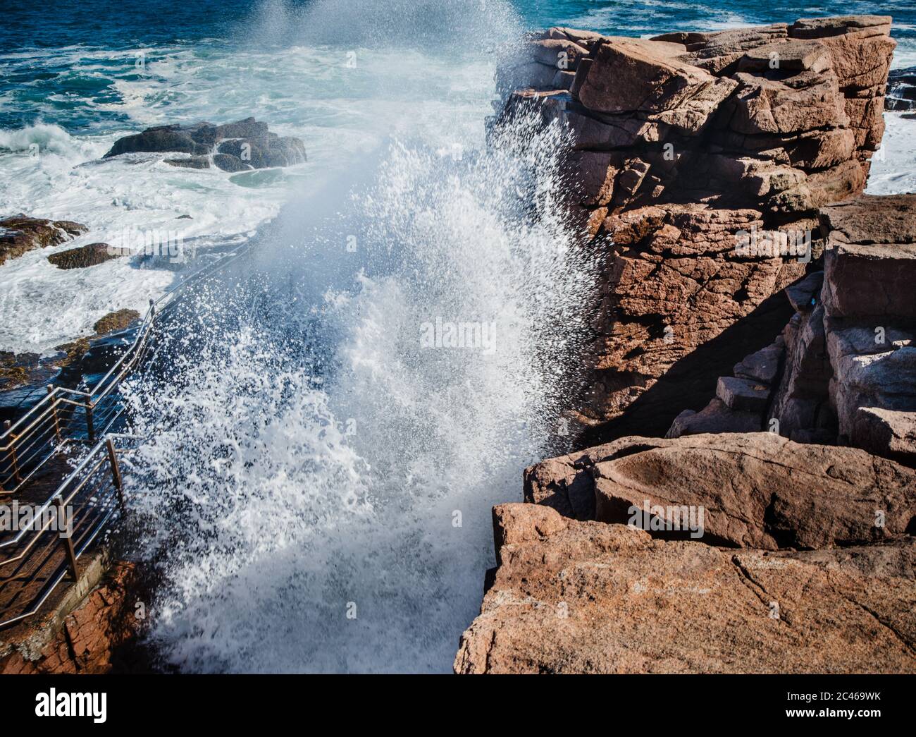 Thunder Hole, a small inlet, naturally carved out of the rocks, where ...