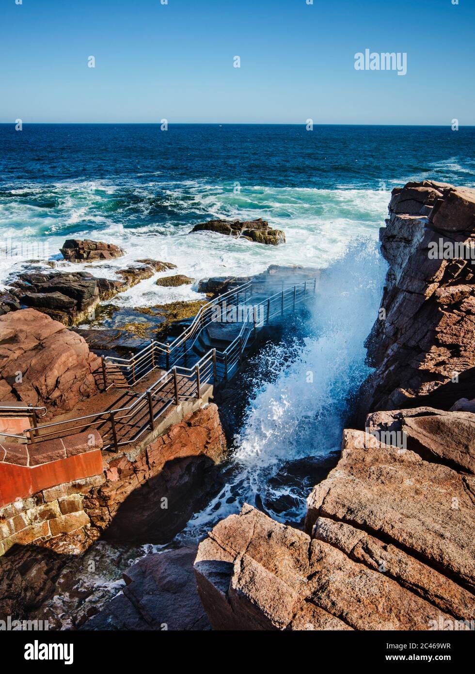 Thunder Hole, a small inlet, naturally carved out of the rocks, where ...