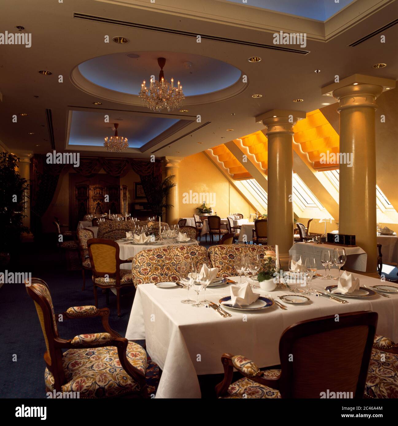 Tables set in roof-top restaurant Stock Photo - Alamy