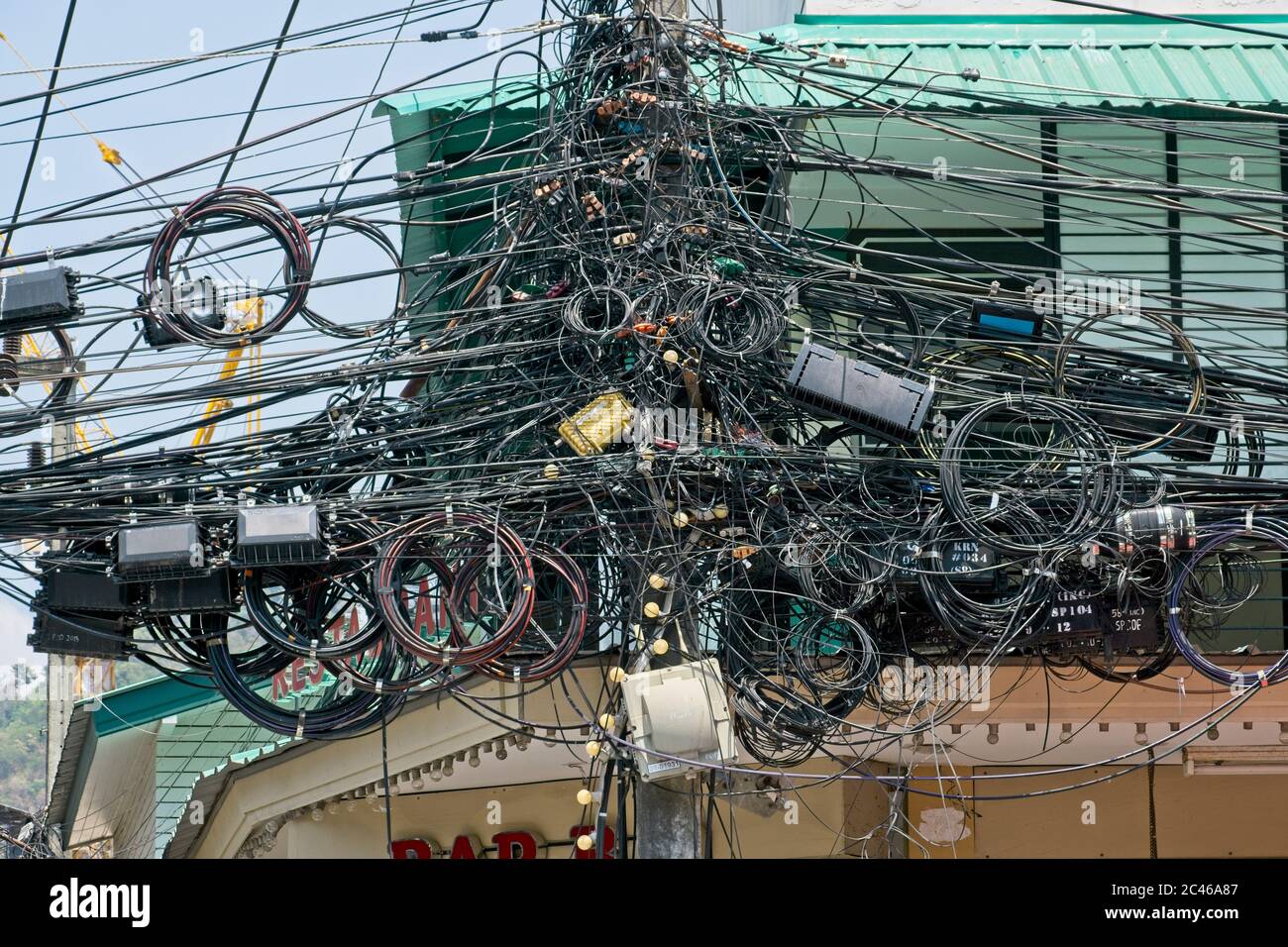 Telecom nightmare chaotic view of overhead cables junction boxes on ...