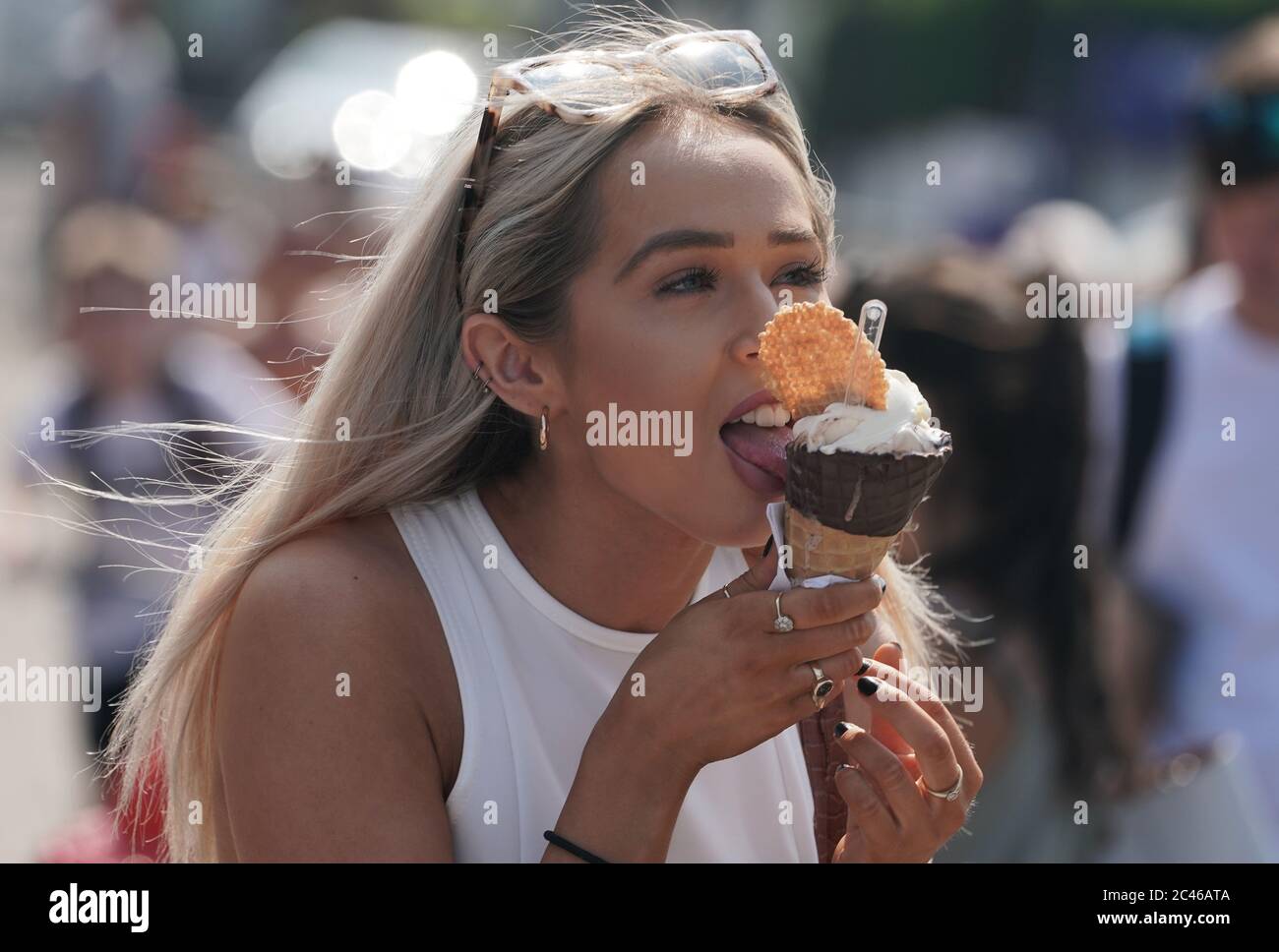 Libby Patterson 20 from Tynemouth enjoys an ice-cream in Whitley Bay ...