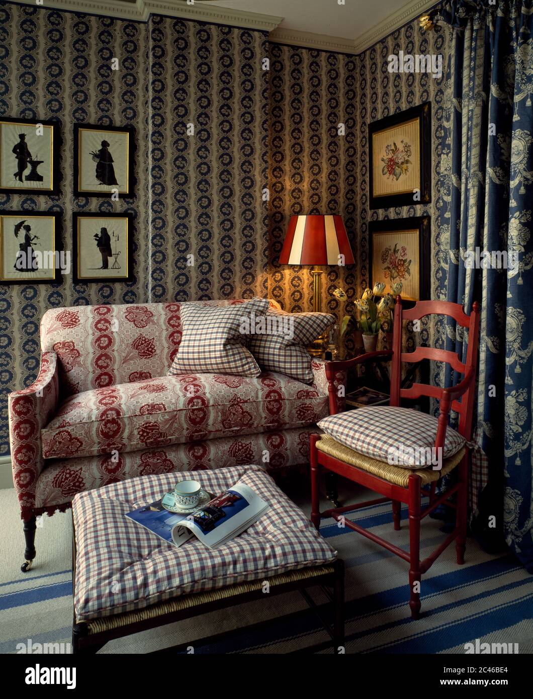 Traditional designer room with fabric wall covering Stock Photo - Alamy