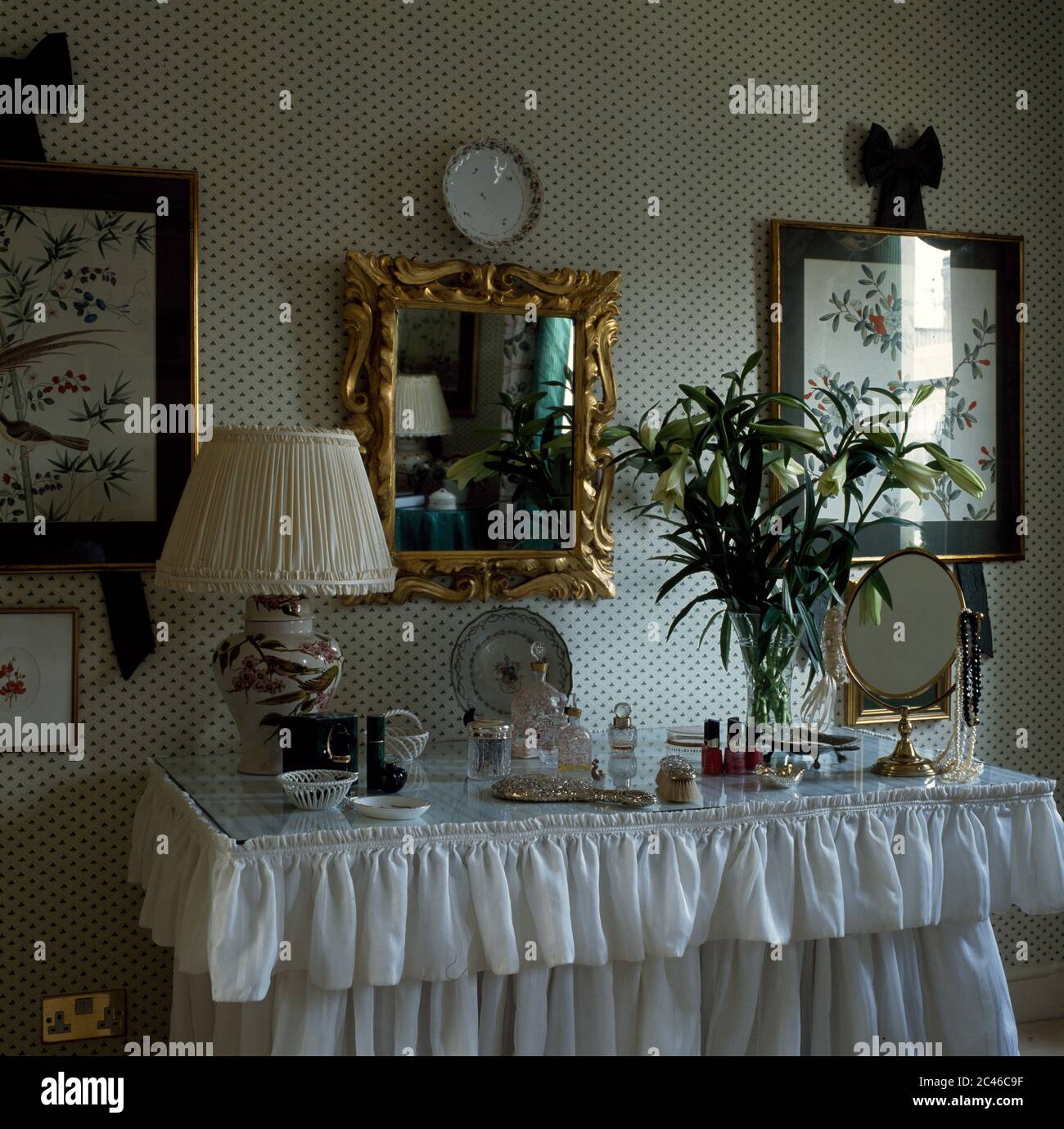Closeup of square dressing table with gilt mirror over Stock Photo - Alamy