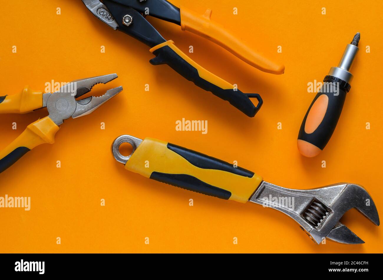 Creative background with hand tools. Hand tool with black and orange ...