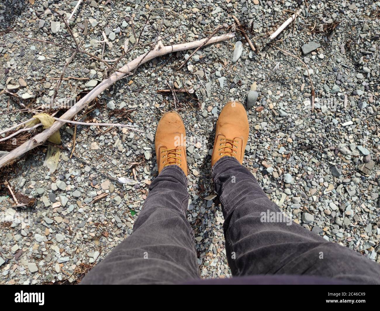 High angel shot of a male feet on the ground Stock Photo - Alamy