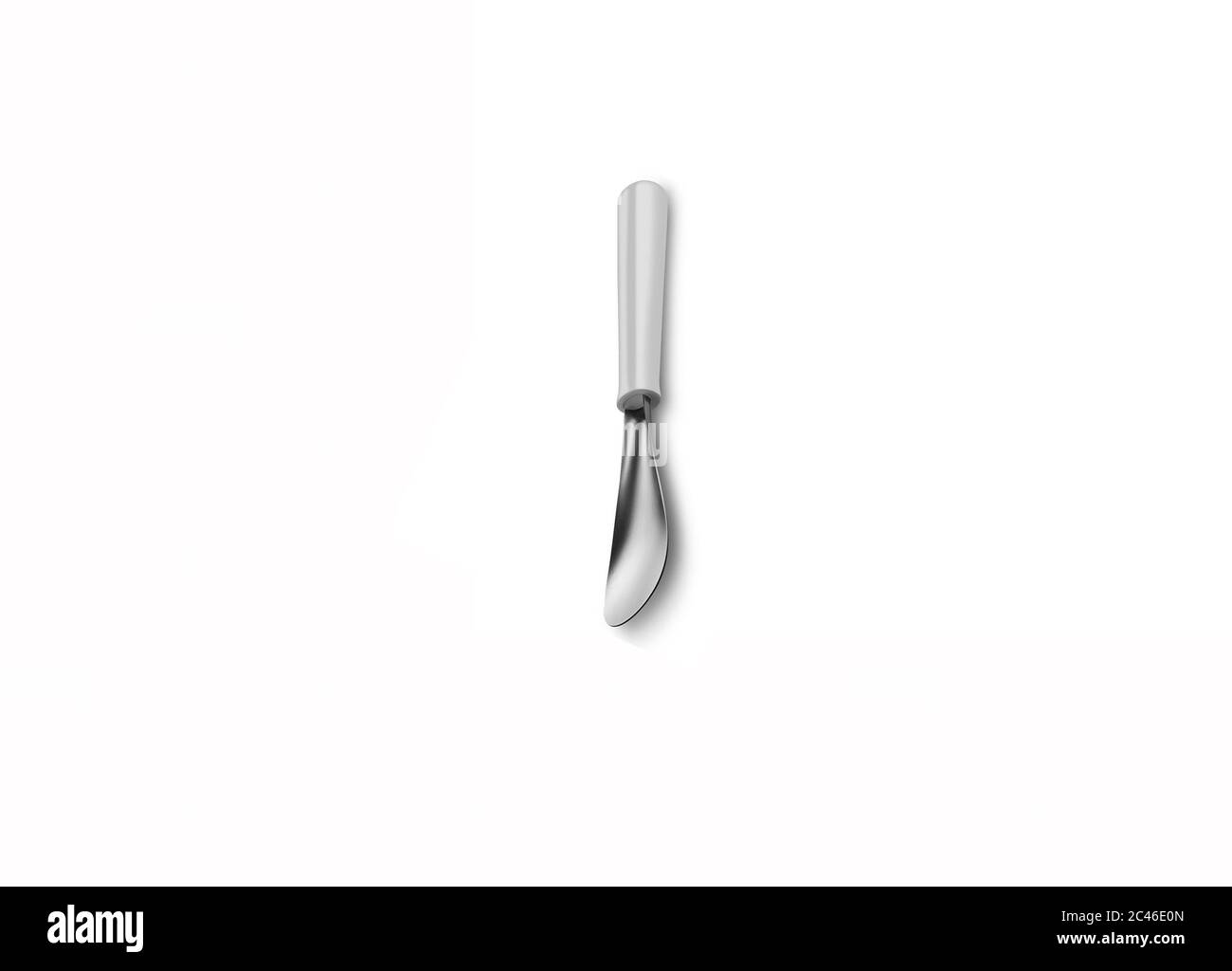 vertically kept one silver metal cooking spatula isolated on a white ...