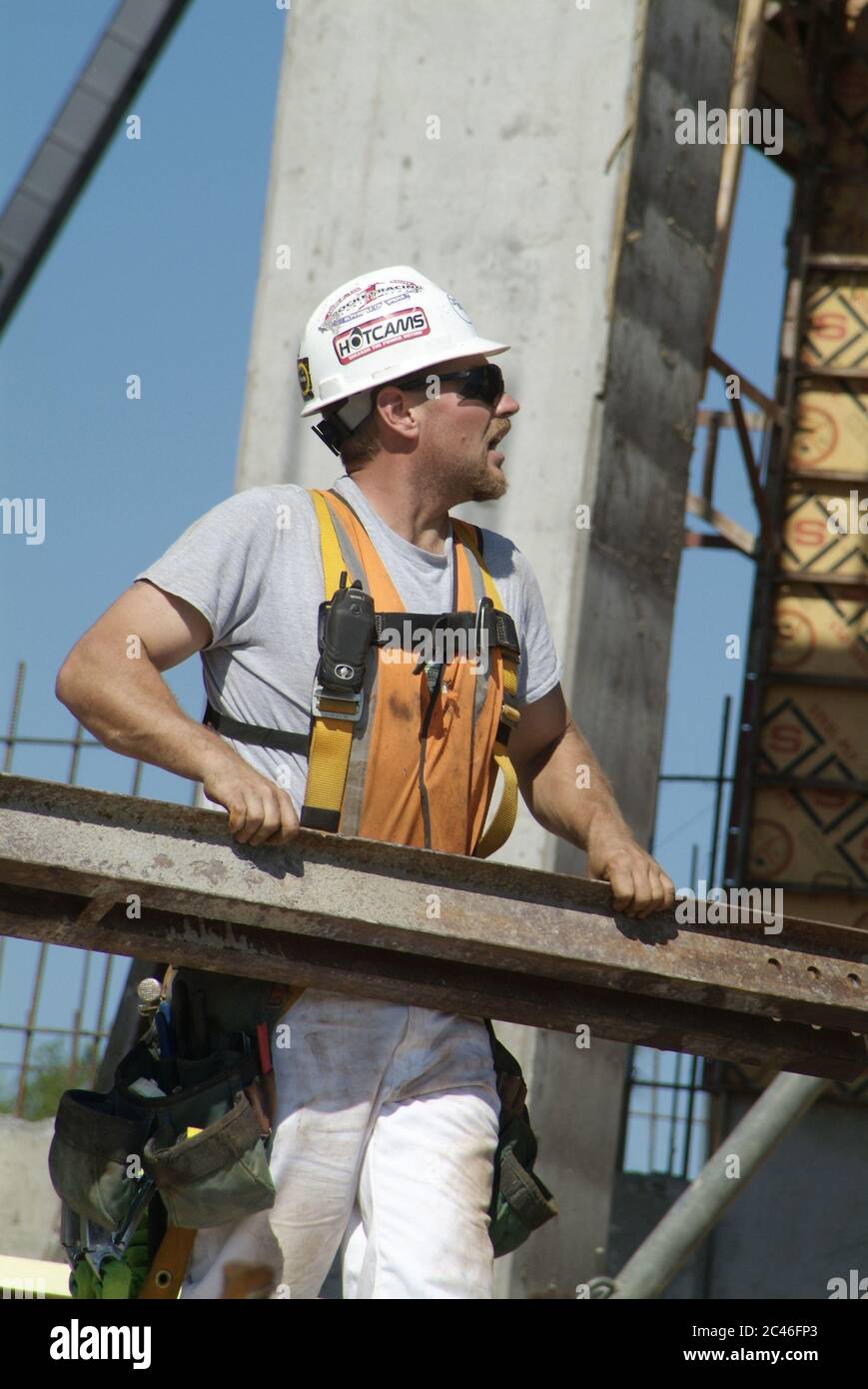 ST. CHARLES, UNITED STATES - Dec 23, 2008: Construction worker handles ...