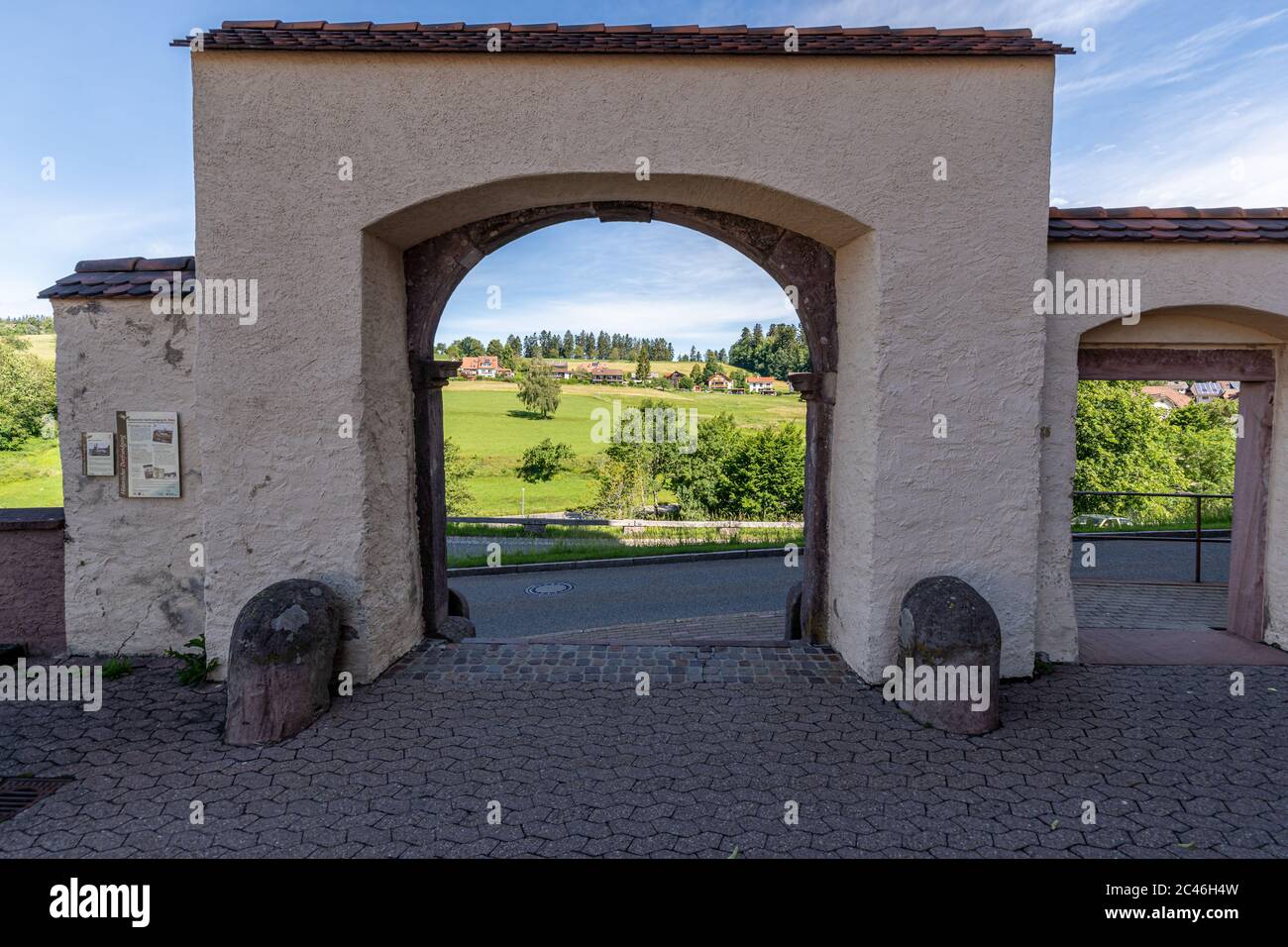 Archway in front of the monastery church of the former Benedictine ...