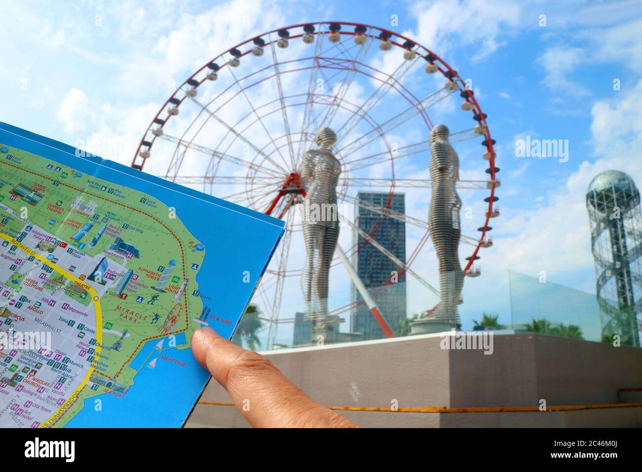 Finger Pointing at Batumi City Map with Blurry Ali and Nino Moving ...