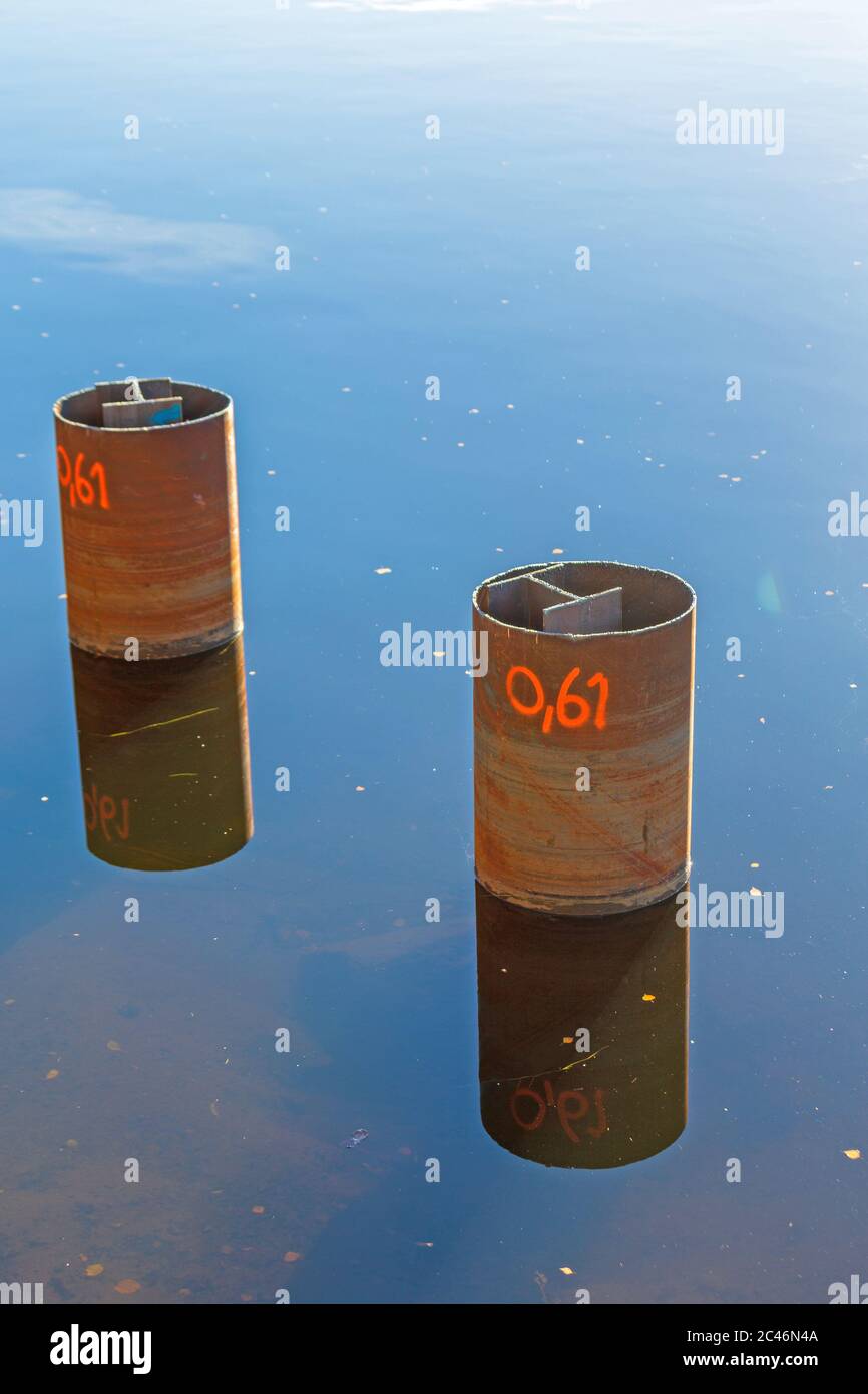Steel Pipes With Beam Support in Water Construction Stock Photo - Alamy