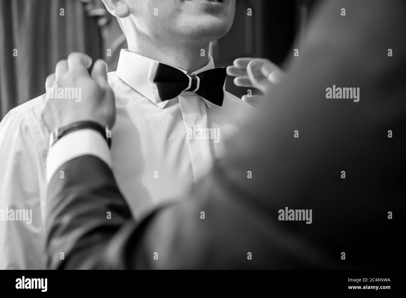 Person wearing red white Black and White Stock Photos & Images - Alamy