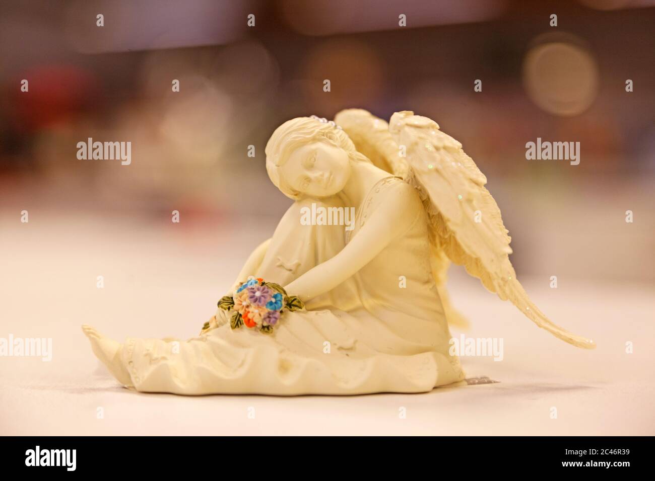 a sitting angel statue in china Stock Photo - Alamy