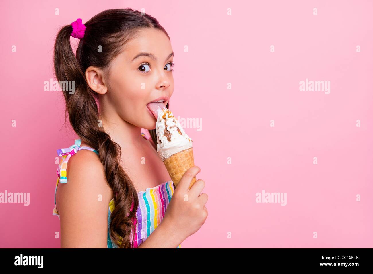 Closeup profile photo of beautiful little lady two cute long tails hold ...