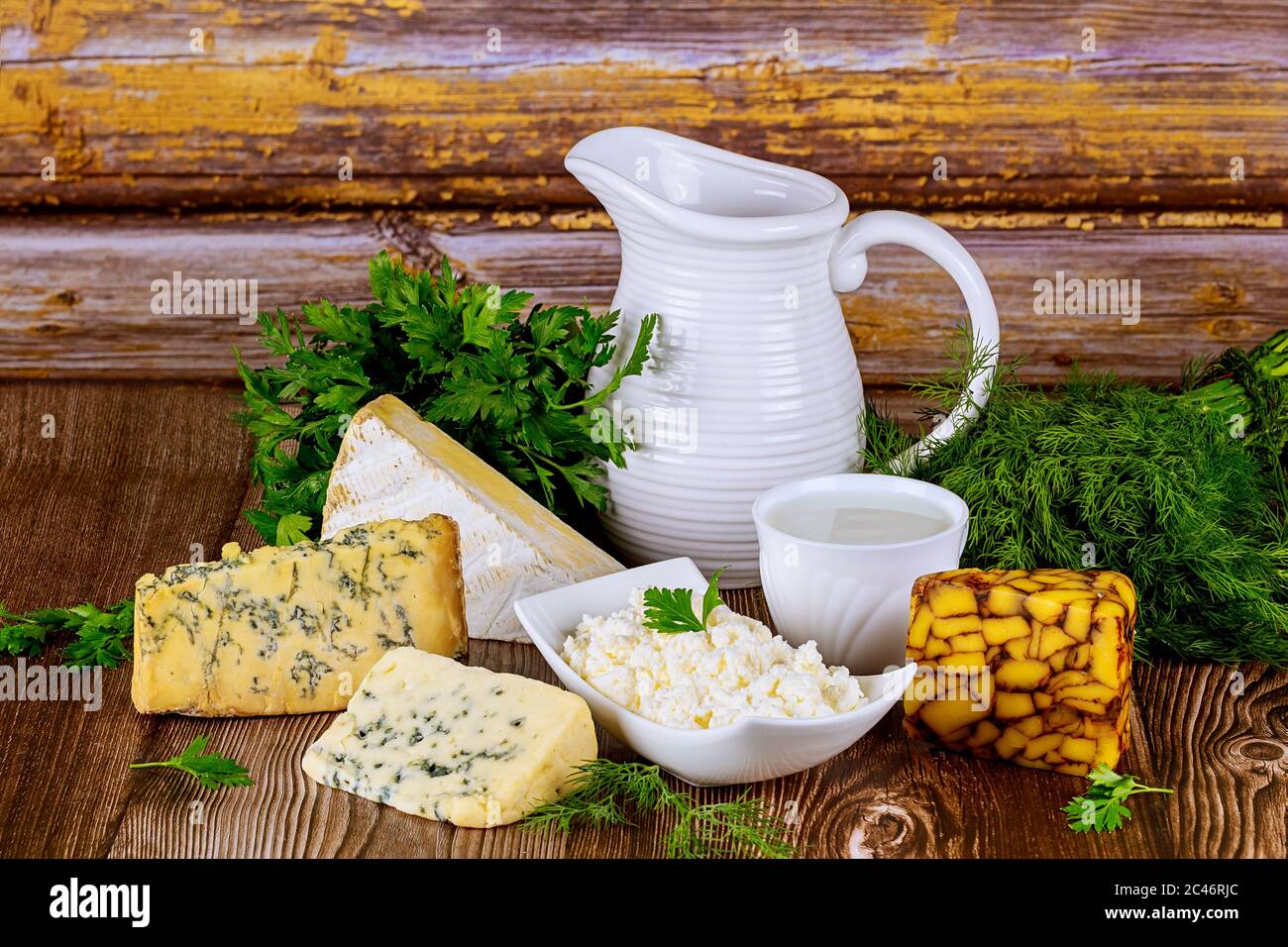 Different types of dairy product, cheese, milk and cottage cheese on ...