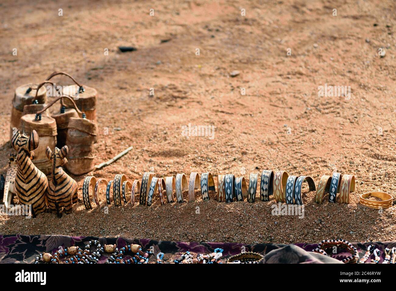 Primitive hand made souvenirs - african style shown on the craft market ...