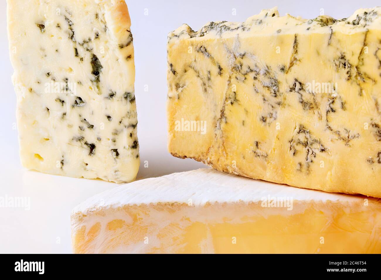 Various types of cheese on isolated white background. Close up Stock ...